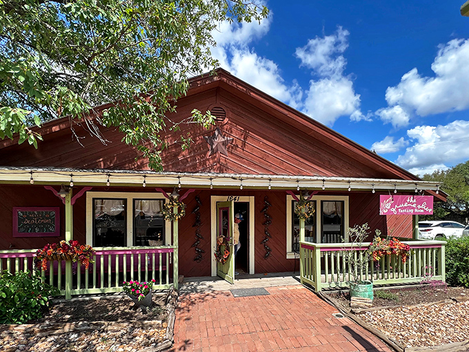 The Gruene Olive Tasting Room welcomes visitors with rustic charm and vibrant flowers. Step inside this cozy red building to discover olive oils that will make your supermarket varieties weep with inadequacy.