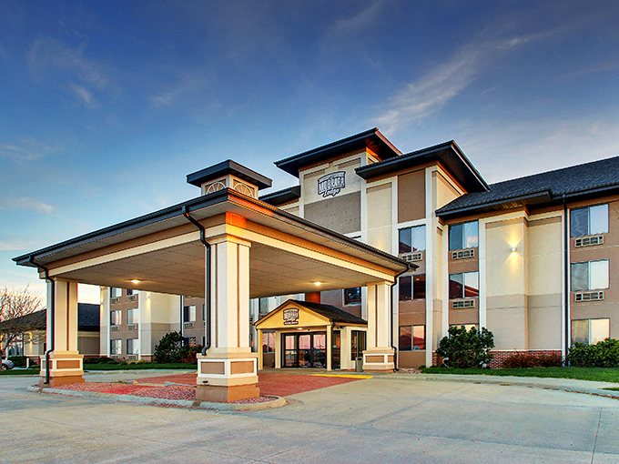 The Niobrara Lodge stands ready to welcome weary travelers with its warm glow, promising comfortable beds and dreams filled with tomorrow's adventures.