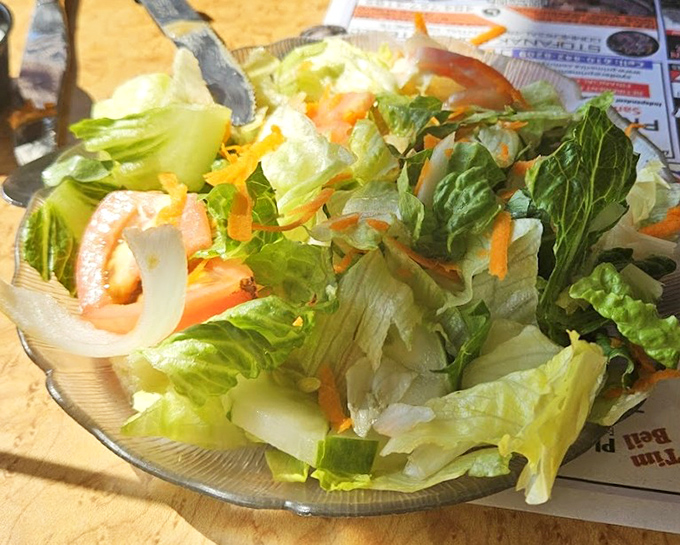 A garden-fresh salad that somehow feels right at home alongside all that delicious diner decadence.