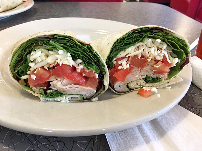 This turkey wrap isn't just lunch&mdash;it's architectural genius. Layers of freshness wrapped up like the gift to your taste buds it truly is.