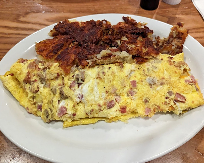 Ultimate omelet living up to its name with enough filling to feed a small village, or one very happy customer.