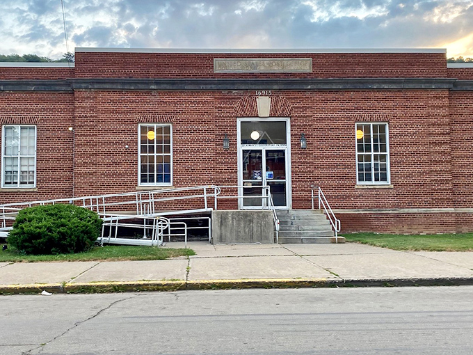 The brick post office, with its Depression-era architecture, remains the communication hub where neighbors still bump into each other collecting their mail.