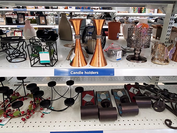 Candle holders that span every design era of the last four decades. That copper one screams 1970s fondue party in the best possible way.