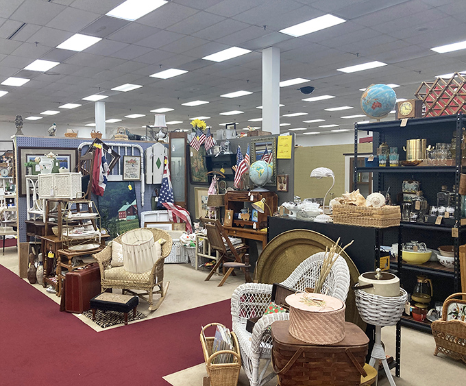 An island of Americana where wicker meets wood, flags flutter indoors, and someone's perfect chair awaits discovery by its destined owner.