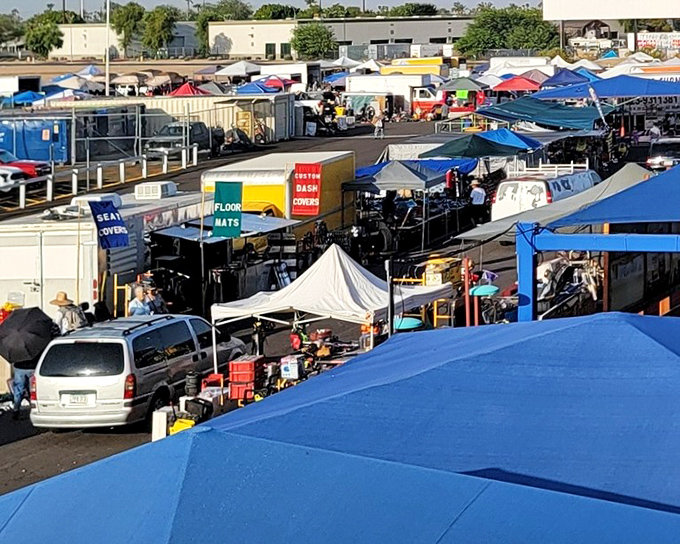 From above, the drive-in resembles a carefully orchestrated dance of vehicles and people, all participating in this delightful communal ritual.