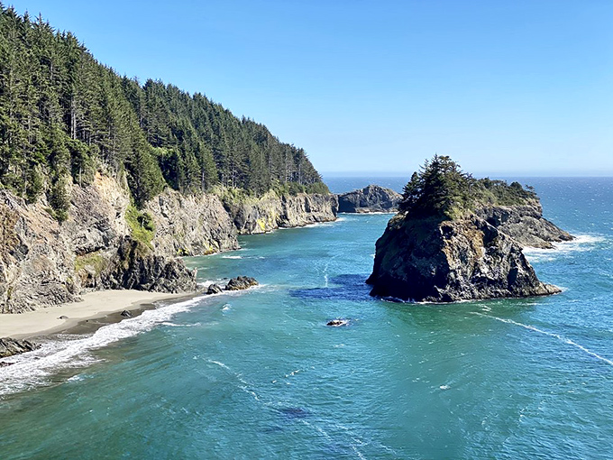 Dramatic headlands plunge into crystal waters &ndash; the kind of view that makes you pause mid-hike, suddenly forgetting your destination.