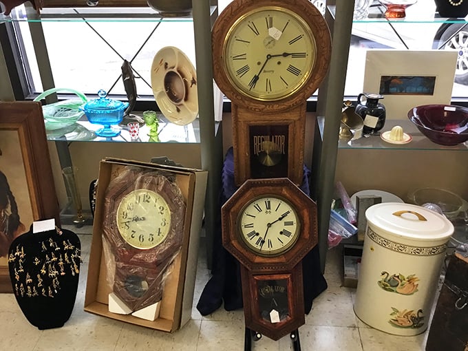 A congregation of clocks that have literally seen different times. That regulator pendulum clock has probably witnessed more history than your high school textbook.
