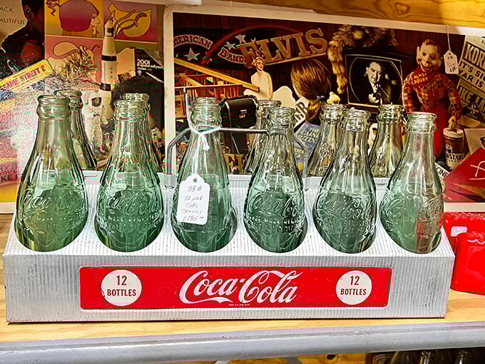 These aren't just empty bottles &ndash; they're six perfectly preserved vessels of Coca-Cola history, each green glass curve and embossed logo telling stories of refreshment past.