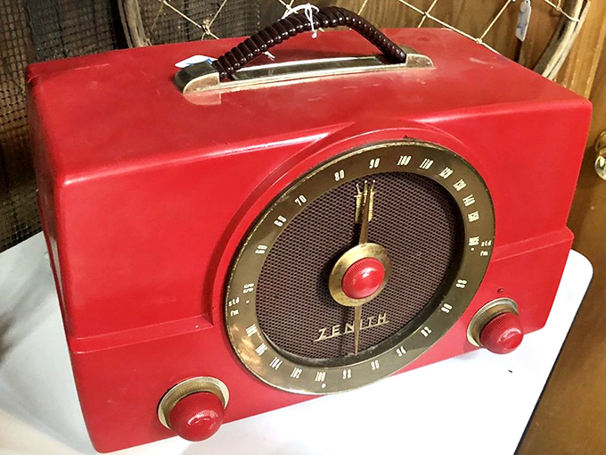 Music in a suitcase! This cherry-red Zenith radio once delivered news and tunes to families gathered around it like a warm hearth.