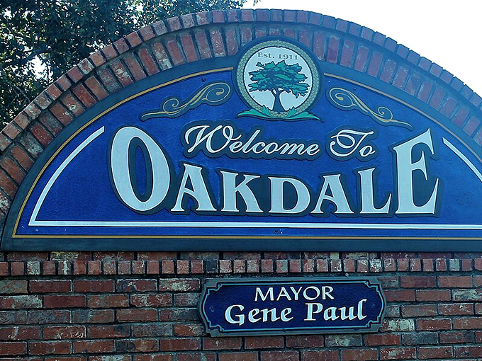 Every great small town deserves a proper introduction—Oakdale's welcome sign proudly displays its oak tree heritage since 1911.