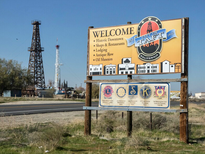 Taft's welcome sign proudly announces its oil heritage and small-town amenities—no flashy promises, just authentic California living at reasonable prices.