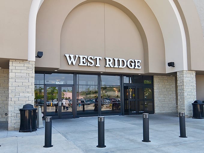 West Ridge Mall welcomes shoppers with that familiar "I could find anything here" promise that keeps department stores in business. 