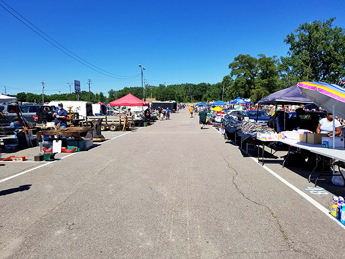 The outdoor market stretches toward the horizon, a temporary city of tables where haggling is not just allowed but expected.