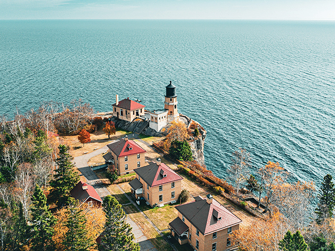 From above, the lighthouse compound reveals itself as a little village perched at the edge of forever, where Lake Superior stretches to the horizon like a freshwater ocean.