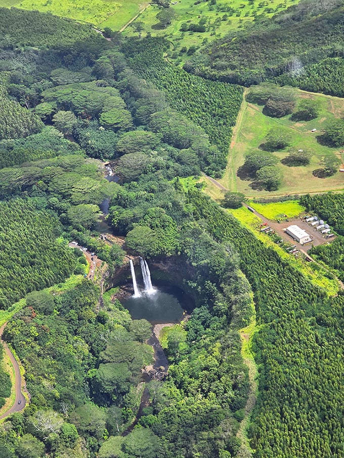 From above, Wailua Falls looks like nature dropped a perfect watercolor painting onto Kauai's landscape.