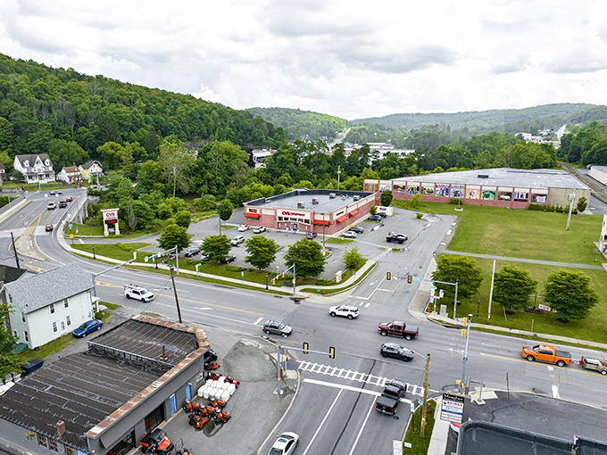 This aerial view reveals Honesdale's perfect nestling among Pennsylvania's verdant hills—a town that understood the assignment of blending with its natural surroundings.