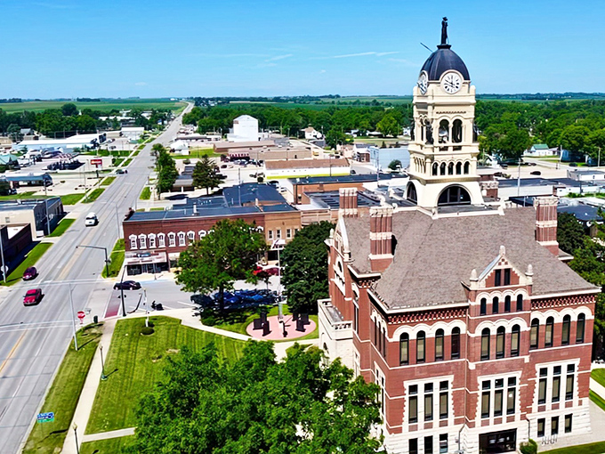 From above, Hampton reveals itself as a perfect grid of midwestern practicality, where the courthouse stands sentinel over a community that values both roots and branches.