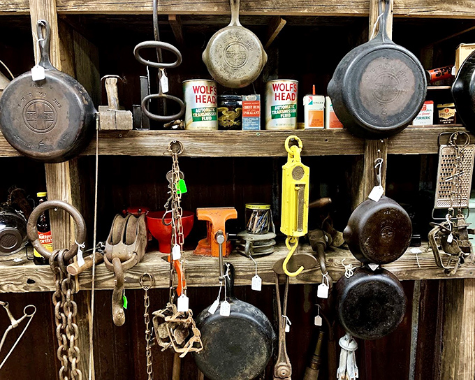 Cast iron that's outlived its original owners hangs with pride. These pans have fried countless breakfasts and will outlast anything in your kitchen drawer.