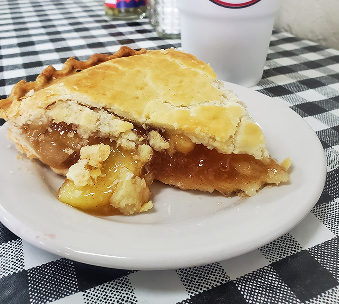 That apple pie filling peeking through the lattice crust is basically autumn captured and served on a plate year-round.