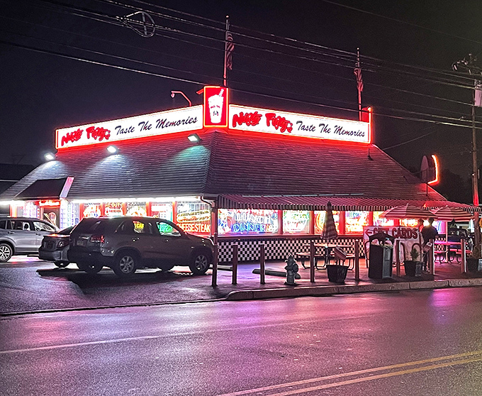 By night, Nifty Fifty's transforms into a beacon of neon-lit nostalgia. Like a lighthouse guiding hungry souls home through the darkness.