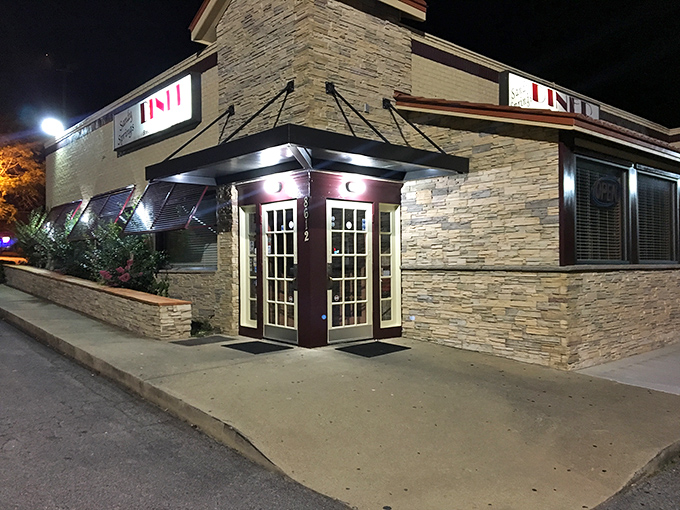 After dark, the diner glows like a beacon for hungry souls seeking comfort and surprisingly good gyros.