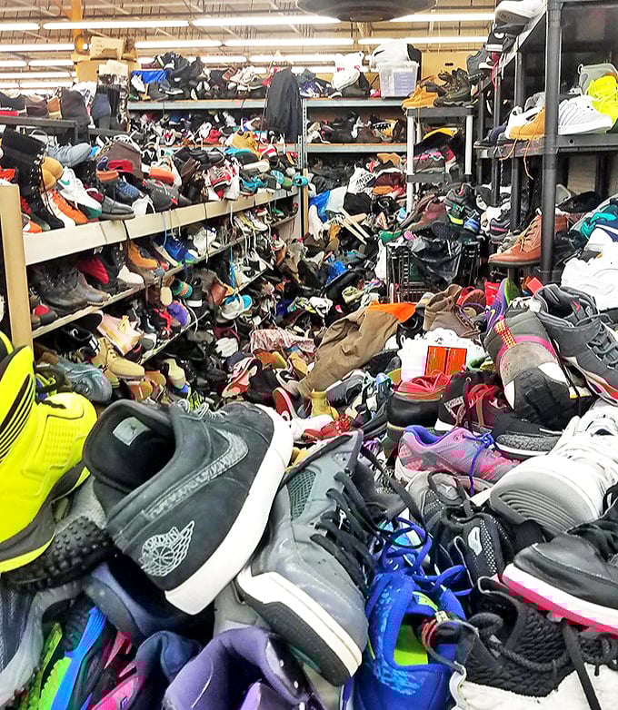 The shoe section resembles what happens when a footwear store sneezes&mdash;chaotic but containing hidden gems.