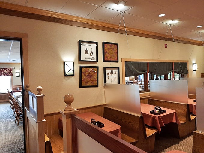 Cozy booths create intimate dining spaces where memories are made between bites of extraordinary ordinary food.