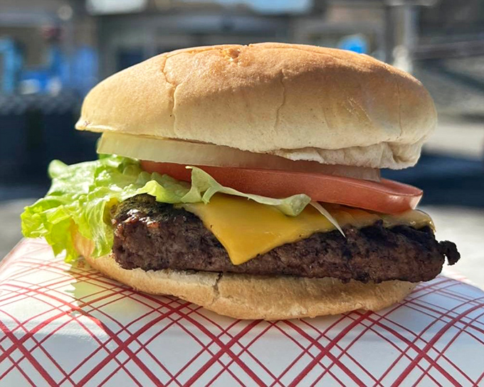 This isn't just a burger&mdash;it's edible nostalgia on a bun, complete with melty cheese and fresh vegetables that make health food seem vastly overrated.