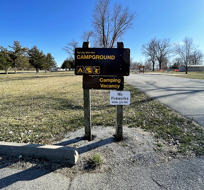 Campground entrance promising adventures that don't require a second mortgage to afford.