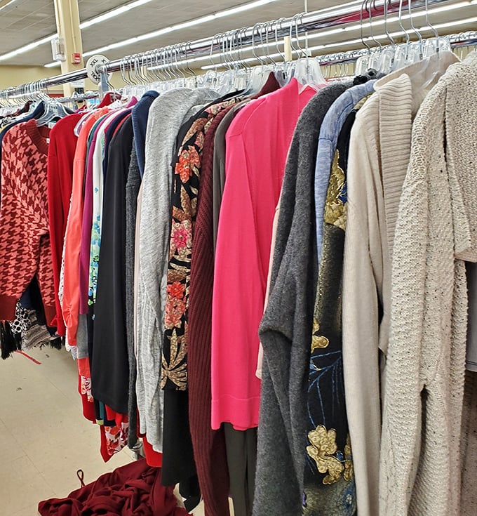 Cardigans and sweaters hanging together in cozy harmony, perfect for layering through Connecticut's unpredictable weather patterns daily.