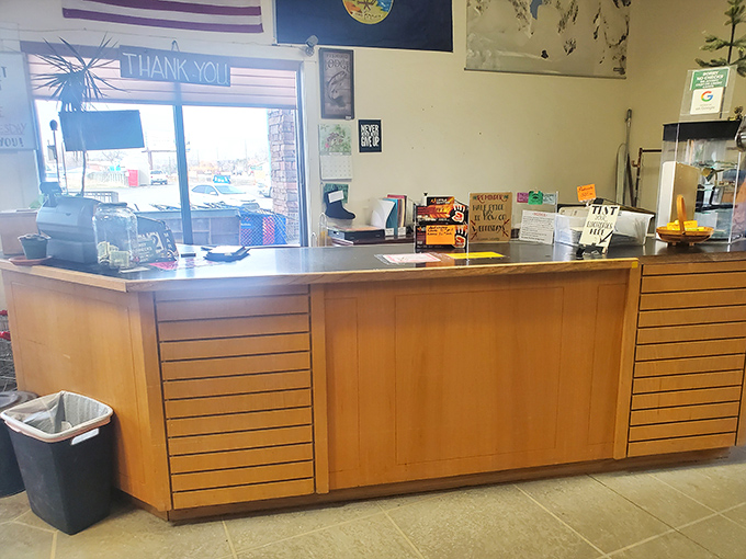 The checkout counter&mdash;final gateway between hunting and gathering. That "Thank You" sign has witnessed countless treasure-finding victories.