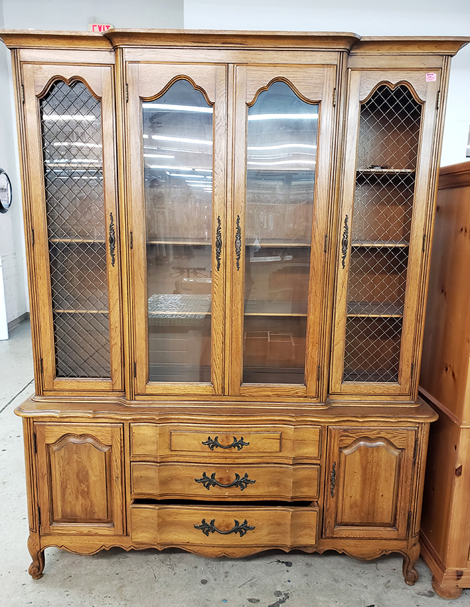 This china cabinet isn't just furniture &ndash; it's a time machine to Sunday dinners at Grandma's, complete with the good dishes.