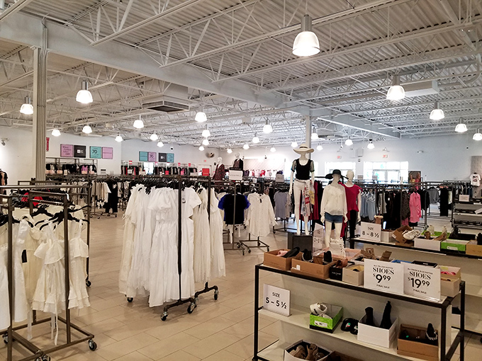 Minimalist displays showcase maximum style. This clothing store's clean lines and organized racks make finding your next wardrobe staple surprisingly zen-like.