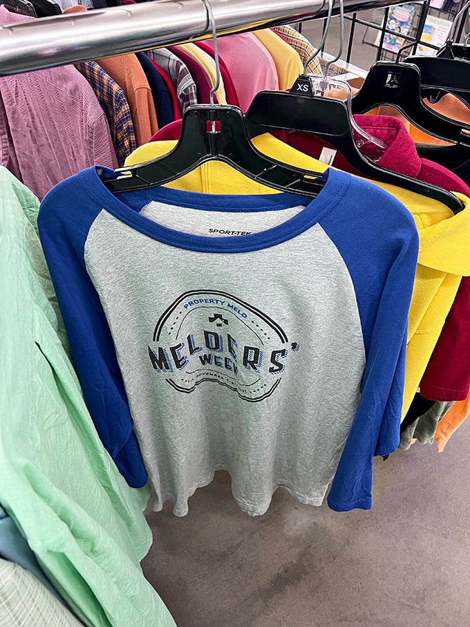 Vintage-style baseball tees hang like trophies waiting to be claimed. Someone's about to score a home run in the style department.