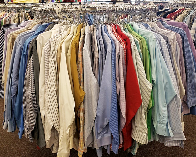 A rainbow of dress shirts hangs in perfect chromatic order&mdash;proof that organization and bargain hunting can indeed be beautiful bedfellows.