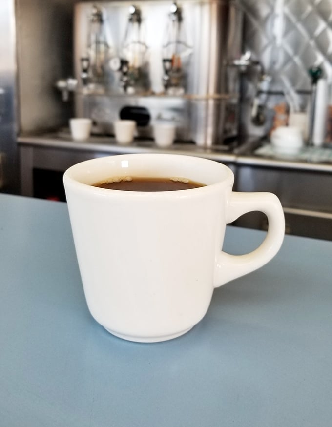 A simple white mug of coffee&mdash;the supporting actor that never upstages the ham but completes the performance perfectly.