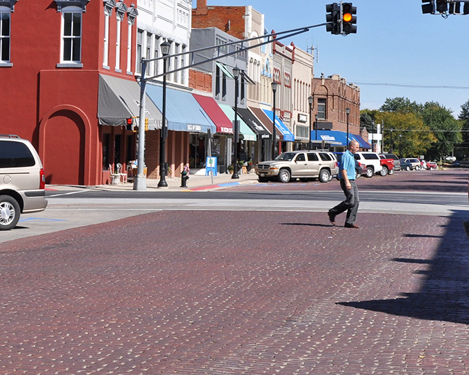 The brick crosswalks of downtown Seward invite pedestrians to slow their pace and remember when "running errands" meant actually running into friends.