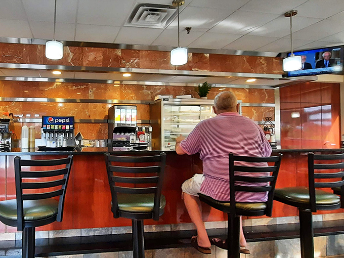 The counter seating &ndash; where solo diners become regulars and the coffee cup is never empty for long.