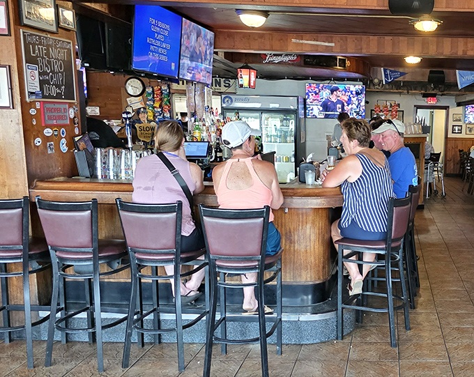 The circular bar &ndash; where solo travelers find community, couples celebrate anniversaries, and everyone agrees the walleye was worth the ferry ride.
