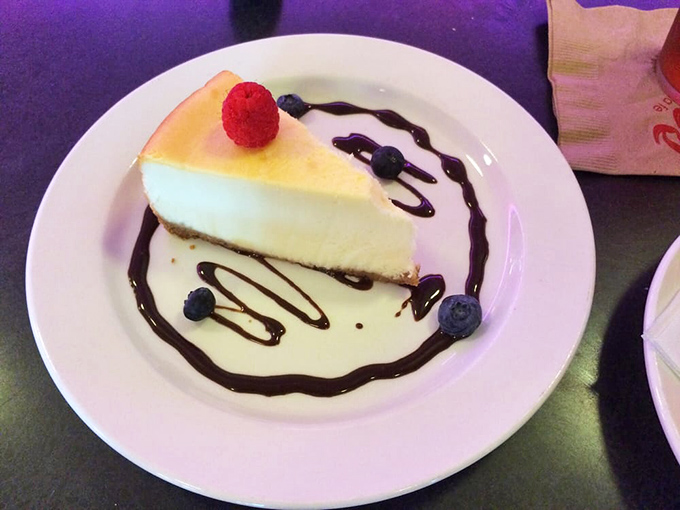 Cheesecake that makes you temporarily forget all your other dessert loyalties. Those berries aren't just garnish&mdash;they're absolution.