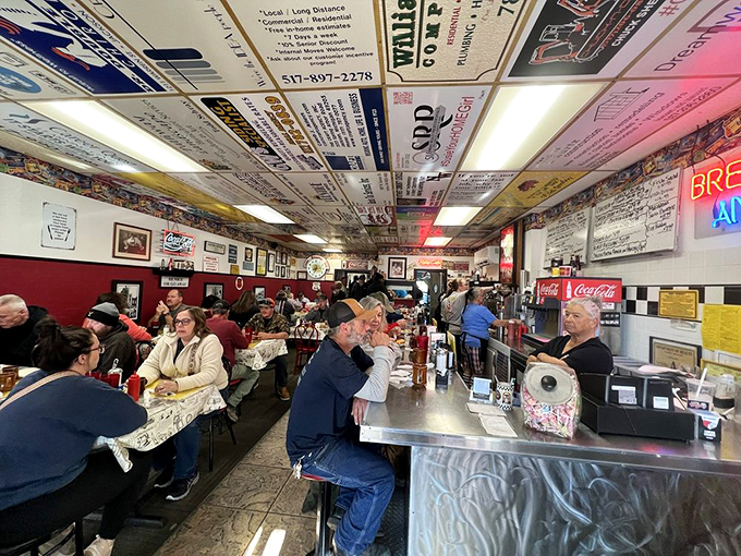 Talk about a lively scene! Pull up a stool at the counter and soak up this classic American diner vibe, where locals know the coffee is always flowing.