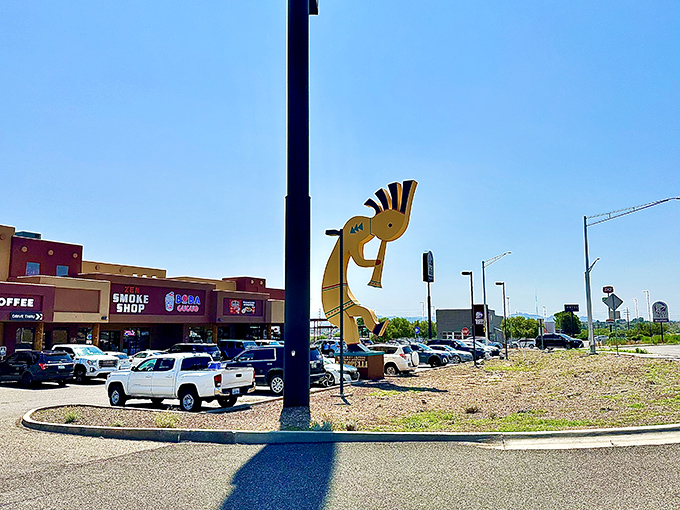 From this angle, you can almost imagine the giant Kokopelli as part of the natural landscape—Arizona's quirkiest mountain range.