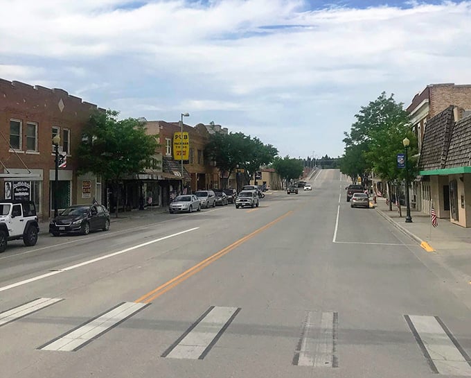 Downtown Lusk in winter shows its resilience&mdash;brick buildings standing strong against snow and time, while life continues at its own deliberate, unhurried pace.