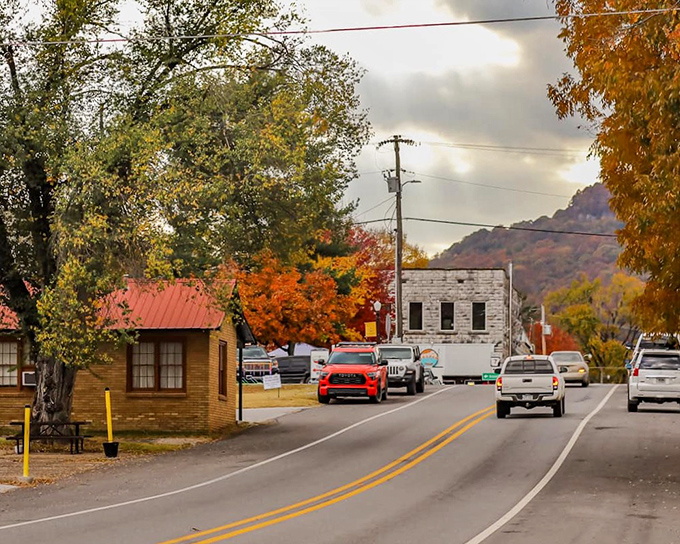 Main Street stretches through town with mountains standing guard, reminding you that some places refuse to sacrifice character for convenience.