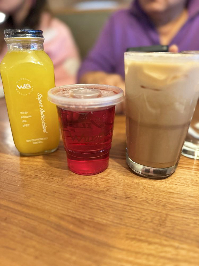 Bottled sunshine and caffeinated joy&mdash;because sometimes you need liquid reinforcements to process the breakfast menu's magnificence.