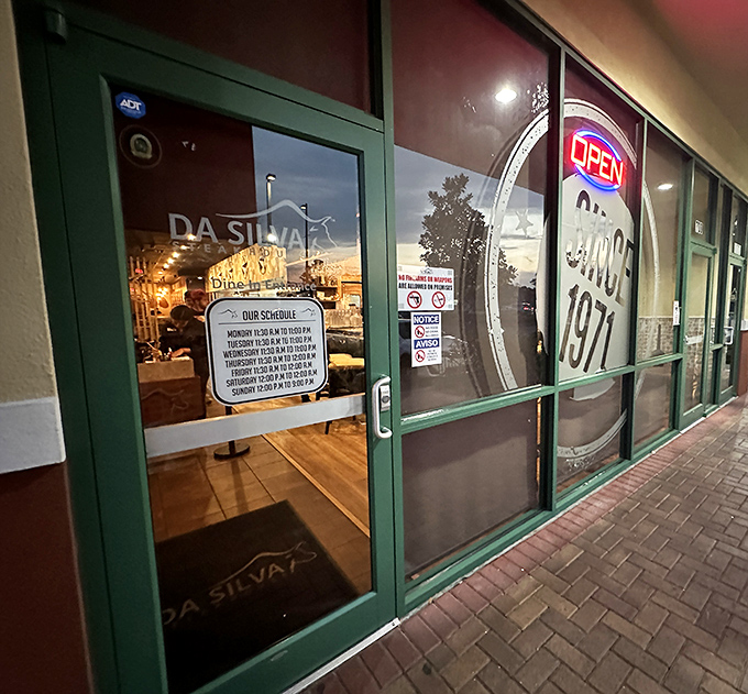 The entrance tells you everything you need to know: come hungry, leave happy. Operating hours posted for your meat-planning convenience.