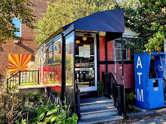 The entrance to Palace Diner – where that blue awning might as well be a superhero cape for a building that's saved countless hungry souls.