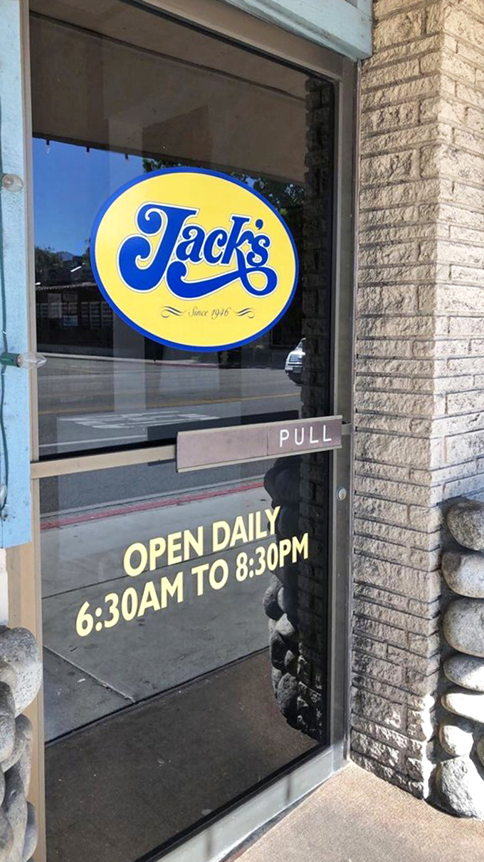 The entrance promises early morning salvation for adventurers&mdash;open at 6 because mountain days start early and proper fuel is non-negotiable.