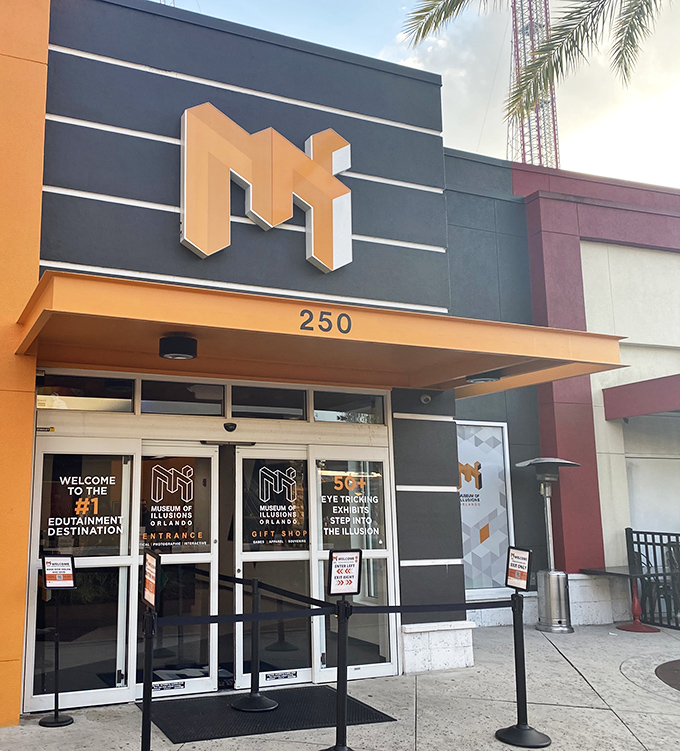 The sleek entrance beckons curious minds with promises of over 50 exhibits. Like a portal to another dimension, these doors lead to a world where nothing is as it seems.