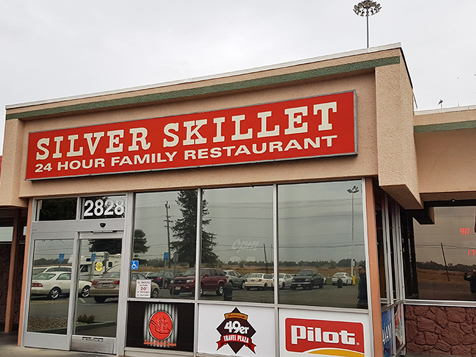 The Silver Skillet sign announces "24 Hour Family Restaurant" like a beacon of hope for midnight hunger emergencies and early risers alike.